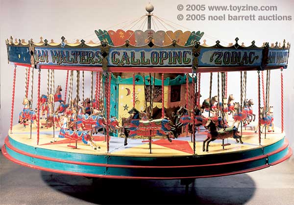 6ft in diameter mechanical carousel with finely carved wooden horses is ...